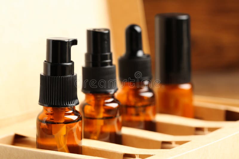 Bottles with Oil in Box, Closeup. Natural Cosmetics Stock Image - Image ...