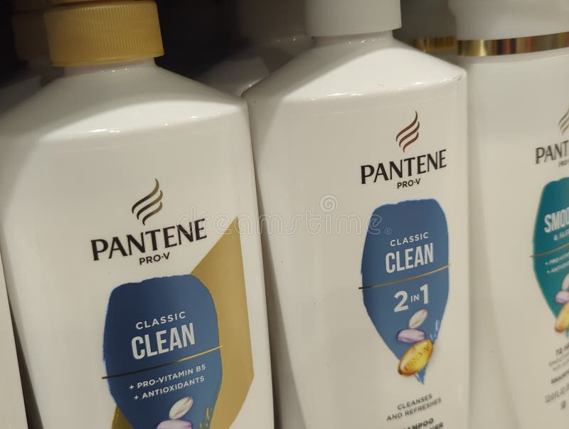 Bottles of Pantene Pro V Shampoo Conditioner Brand Logo on Shelf ...