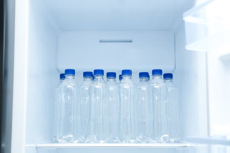 Bottles of Pure Water Inside Refrigerator Stock Photo - Image of ...