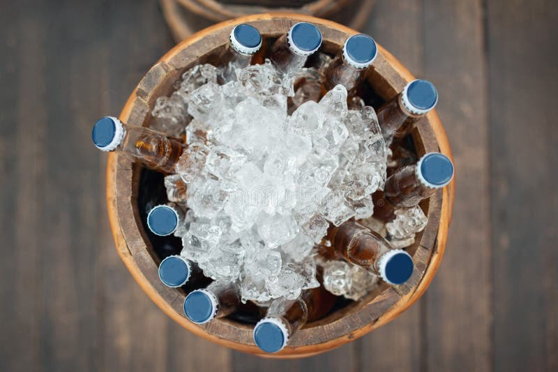 Bottles of Refreshing Cold Drink in Wooden Bucket Stock Photo - Image ...