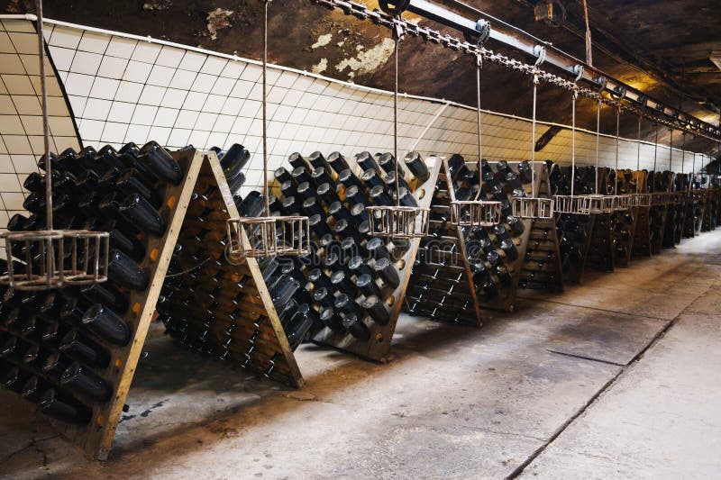 Bottles Stored in Racks during Fermentation Process in a Cellar Stock ...
