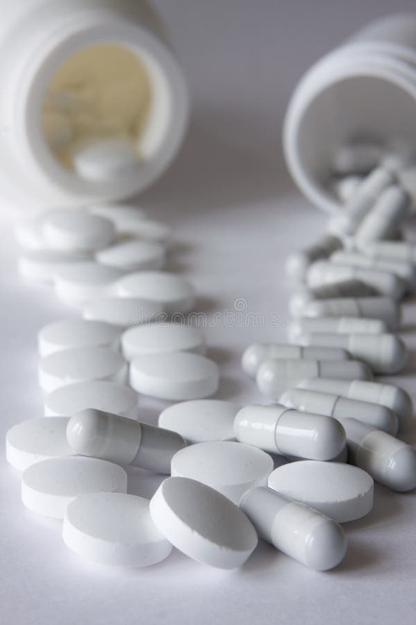 Bottles with tablets stock image. Image of expensive, medicare - 8113255