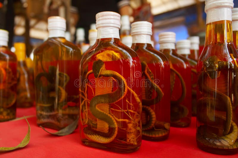 Bottles of Whiskey and Snakes Stock Image - Image of liquor, bottle ...