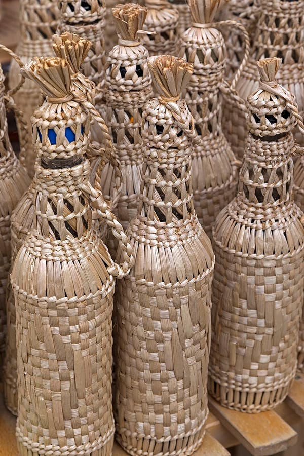 Bottles Wrapped with Wicker Stock Photo - Image of wood, tied: 77206056