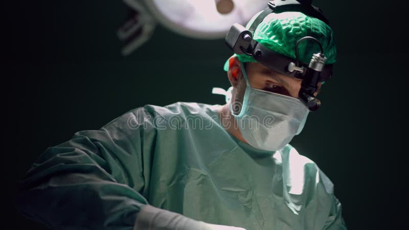 Bottom Angle View of Concentrated Surgeon Performing Operation in Slow ...