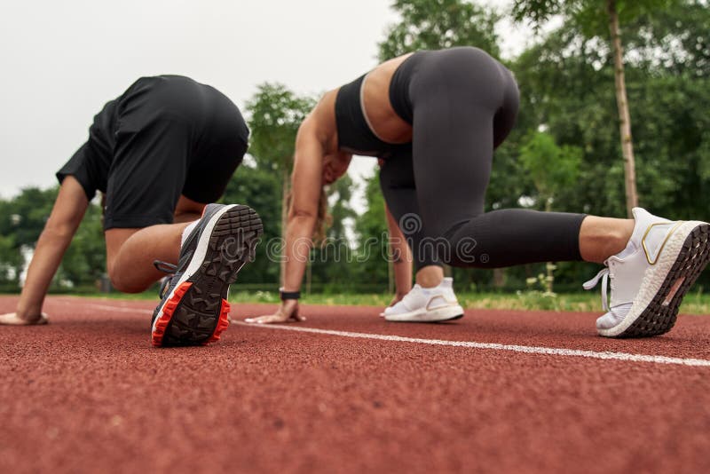Bottom Back of Mother and Son on Start before Run Stock Image - Image ...