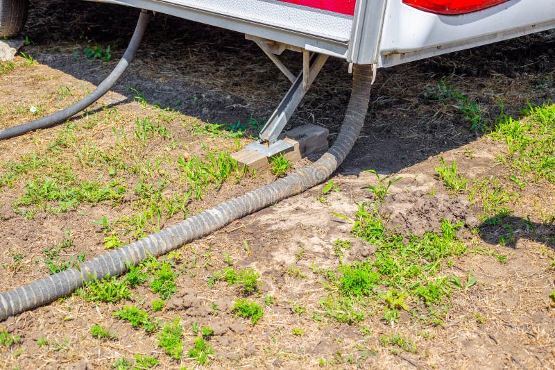 On the Bottom of the Camper, a Connection between Hoses and Support ...