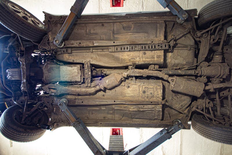 The Bottom of the Car is Raised on a Lift Close-up, the Sides are ...