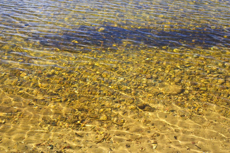 Clear Lake With Pebble Bottom Stock Photo - Image of british, green ...