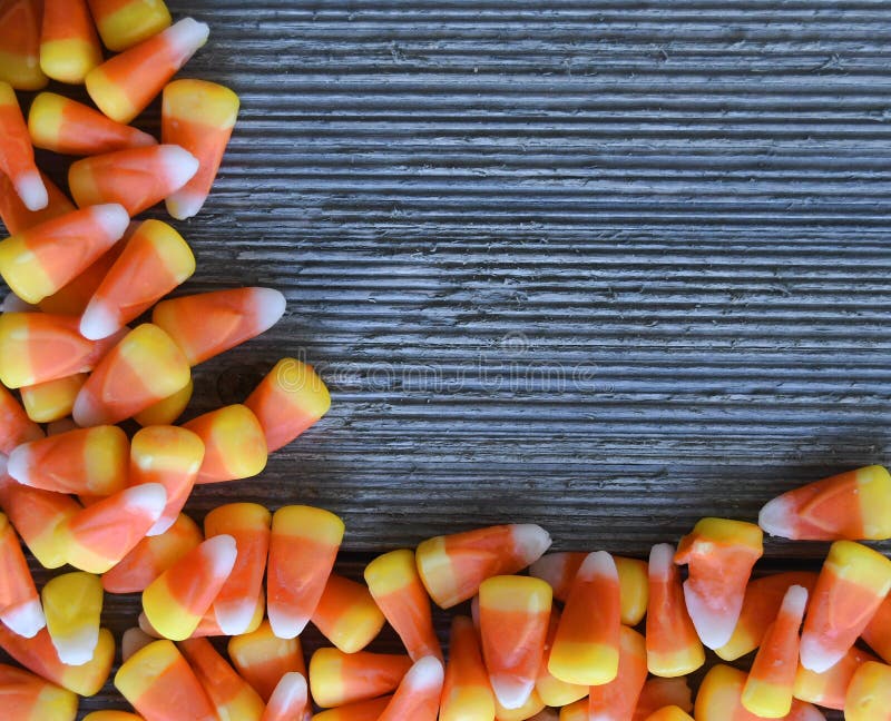 Bottom Left Corner Candy Corn Frame on Blank Wood Background with Copy ...