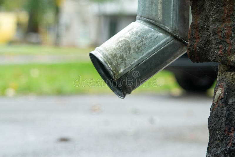 Bottom part of a downspout stock photo. Image of selective - 268851736