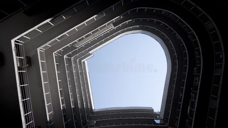 A Bottom Perspective of Rounded Shaped Building. Real Estate. Modern ...