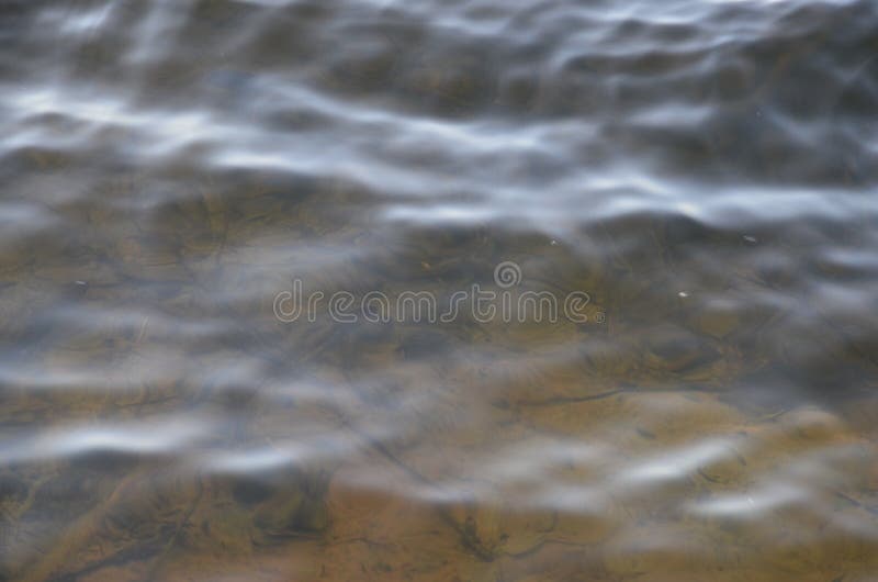 The Bottom of the River is Visible through the Waves of Water Stock ...