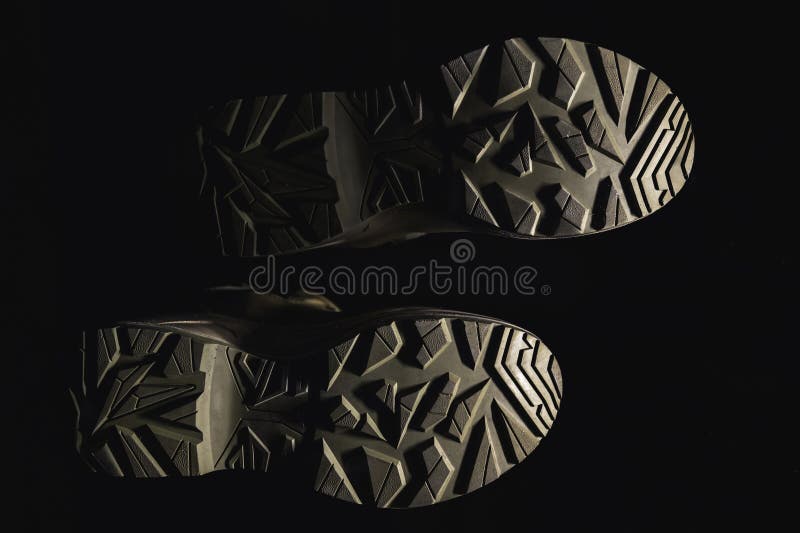 Bottom of Shoes, Isolated on Black Background. Stock Image - Image of ...