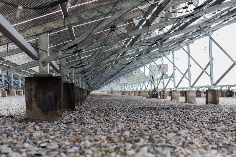 Bottom of the Solar Panel with the Rock in the Ground Stock Image ...