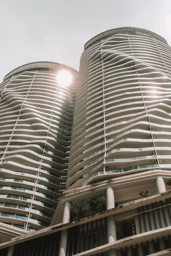 Bottom-up of Tall Skyscraper Covered Reflective Panels Sun Rays are ...