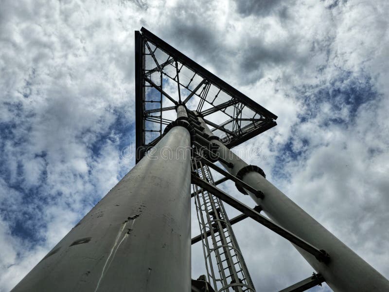 Bottom Up View on a High Triangular Steel Sign Stock Photo - Image of ...
