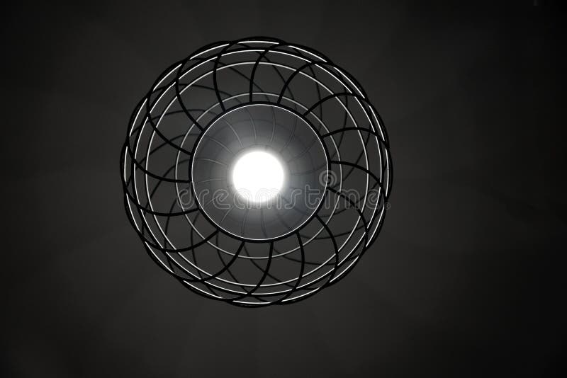 Bottom Up View of a Metal Ring Shape Lamp Shade with Glowing Light Bulb ...