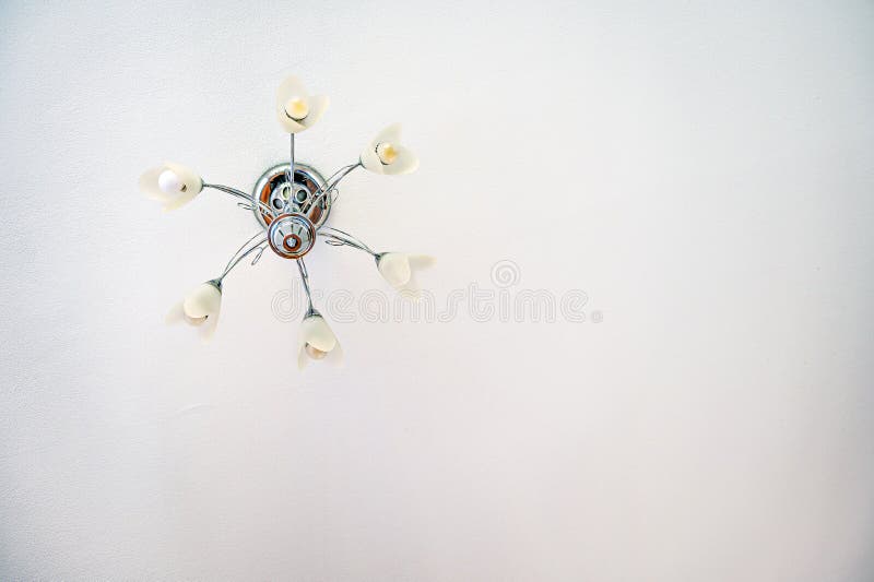Bottom Up View on the Shining Lamp on the White Ceiling Background ...