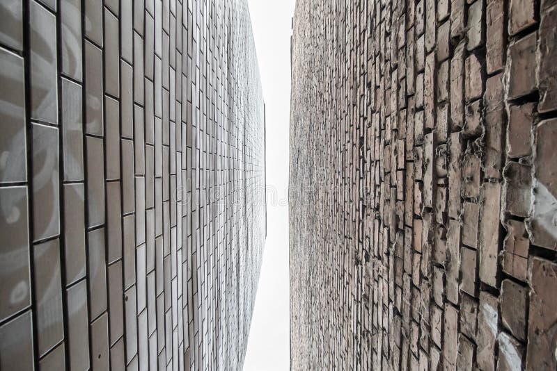 Bottom-up View between Two Brick Walls, Located Close To Each Other ...