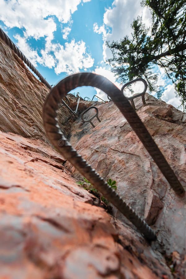 Bottom Up View of a Via Ferrata Stone Wall Along a Climbing Path Stock ...