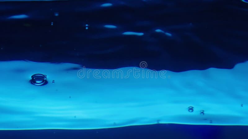 Bottom View of Air Bubbles Rising Up in Water Column and Forming Waves ...