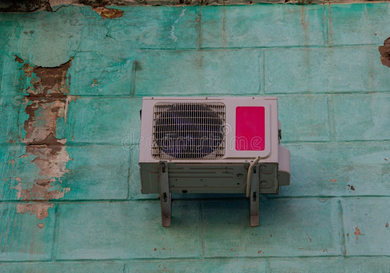 Bottom View of the Air Conditioner Mounted on a Green Light Wall Stock ...