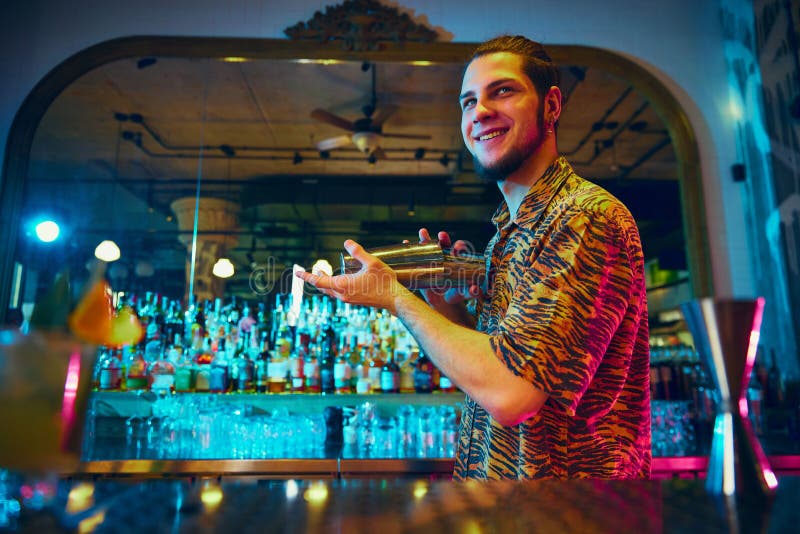 Portrait of Bartender Shaking Cocktail Shaker Making Alcohol Sweet ...