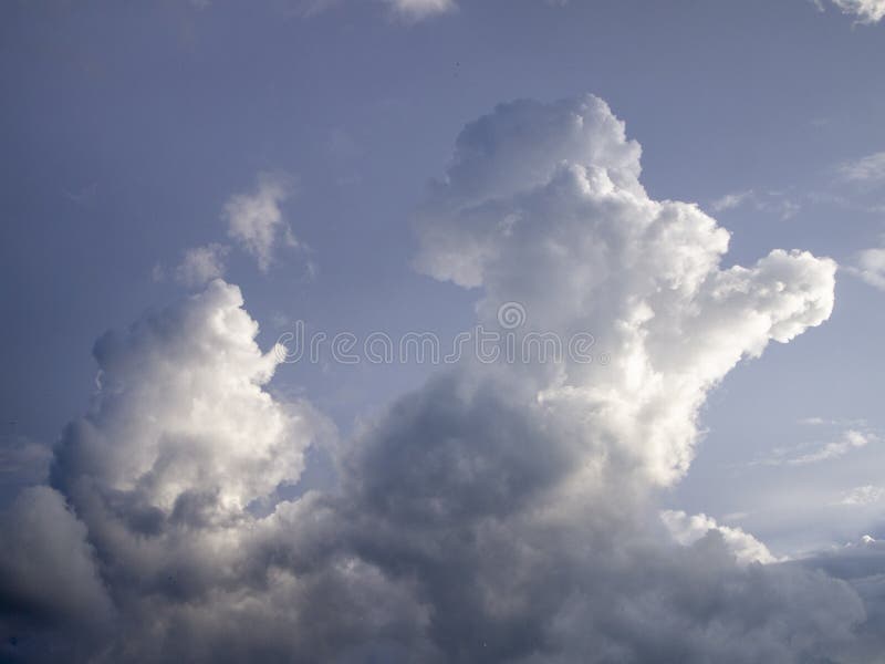 Bottom View of a Bright Blue Sky with Clouds Stock Image - Image of ...