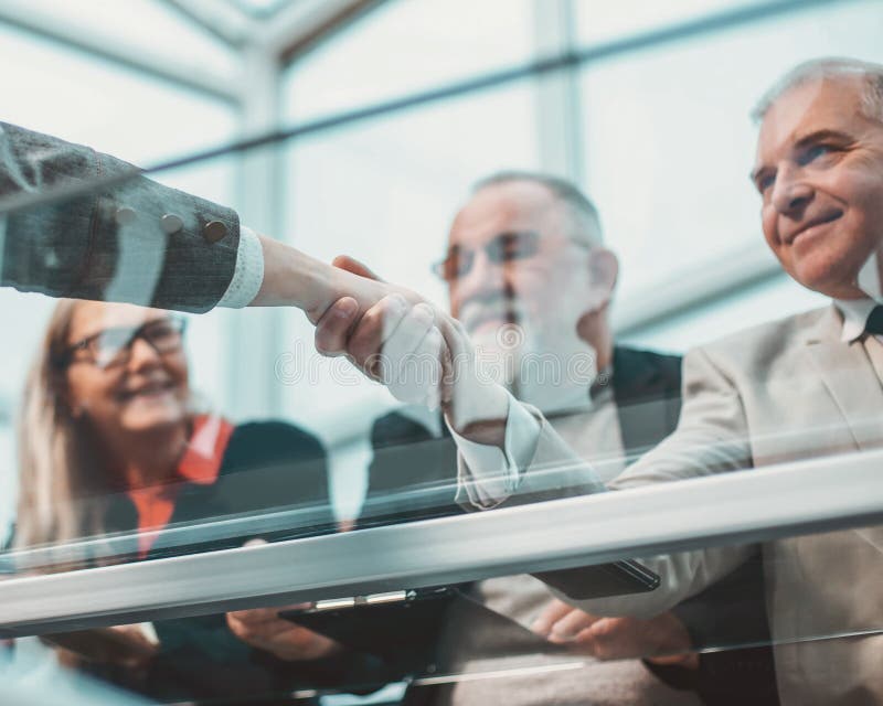 Bottom View. Business Handshake Over the Negotiating Table Stock Image ...