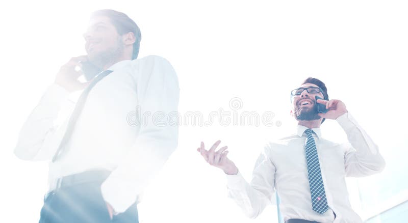 Bottom View.business People Talking on Their Mobile Phone in the Office ...