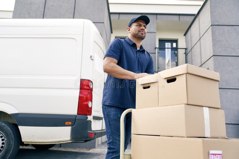 Delivery man at work stock image. Image of order, delivering - 224812171