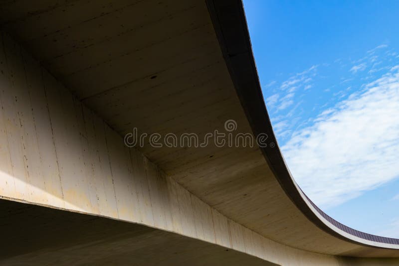 Bottom View of a Curved Bridge Stock Image - Image of people, road ...