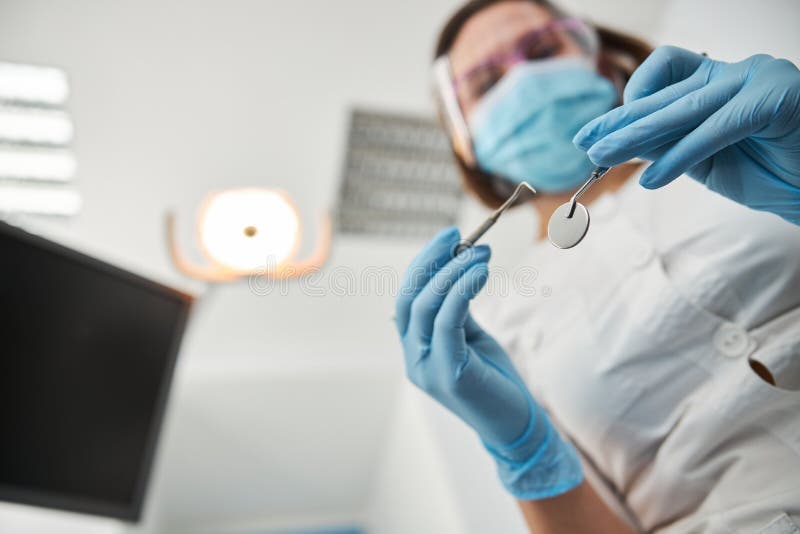 Bottom View of Dental Devices in Medical Worker Hands Stock Image ...