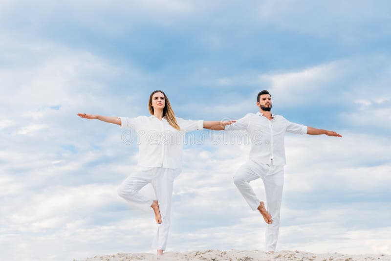 Bottom View of Fit Young Couple Practicing Yoga in Tree Pose Stock ...