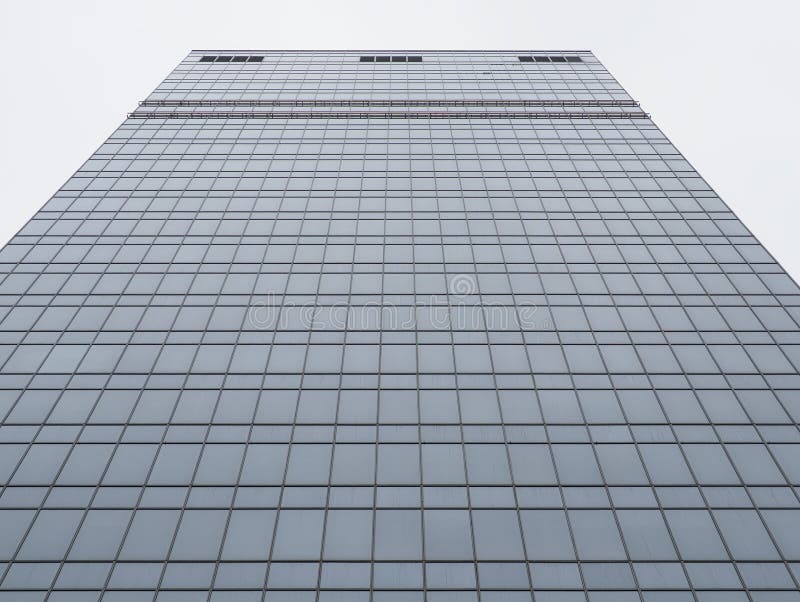 Bottom View of Flat Glass Wall of Skyscraper Stock Image - Image of ...