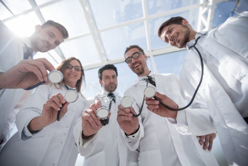 Bottom View.a Group of Doctors Have Put Their Stethoscopes Together ... Bottom View.a Group of Doctors Have Put Their Stethoscopes Together ...