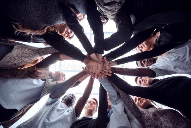 Bottom View. Group of Happy Young People Making a Tower Out of Their ...