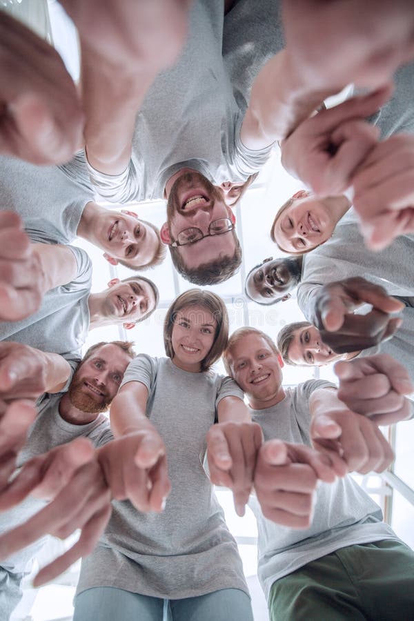 Bottom View. Group of Successful Young People Looking at the Camera ...
