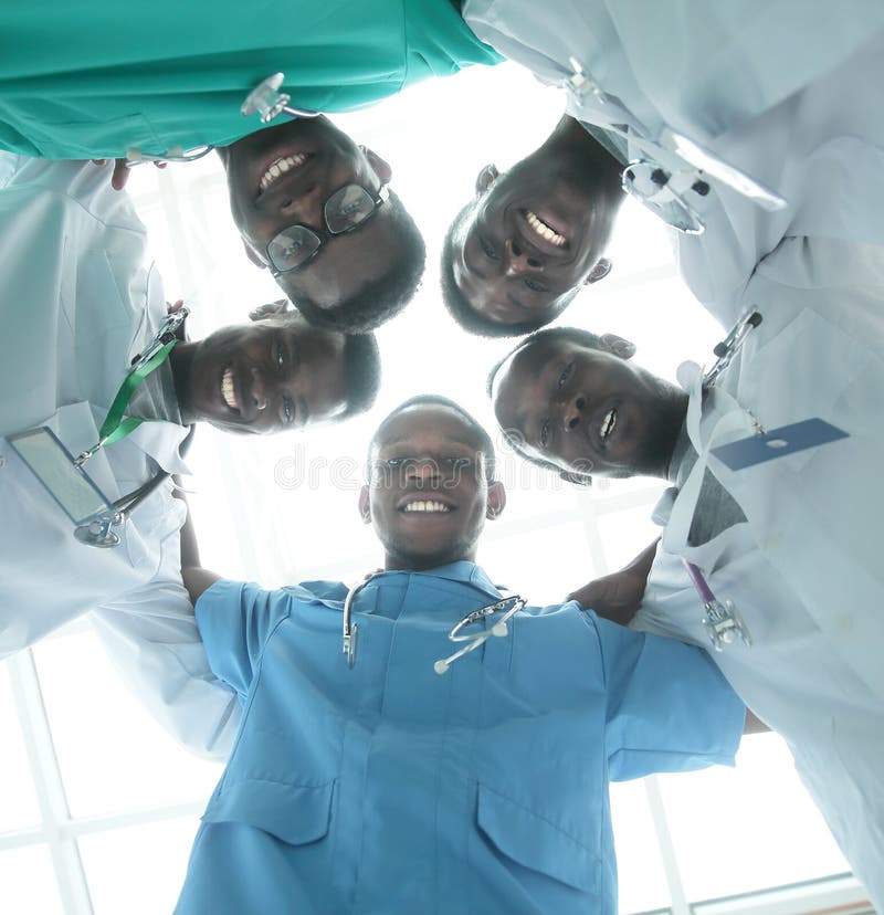 Bottom View. Group of Young Doctors Standing in a Circle Stock Photo ...