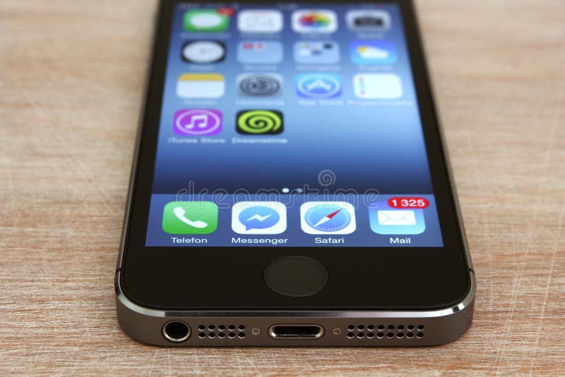 Bottom View of IPhone 5s Lying on Wooden Desk Editorial Photography ...