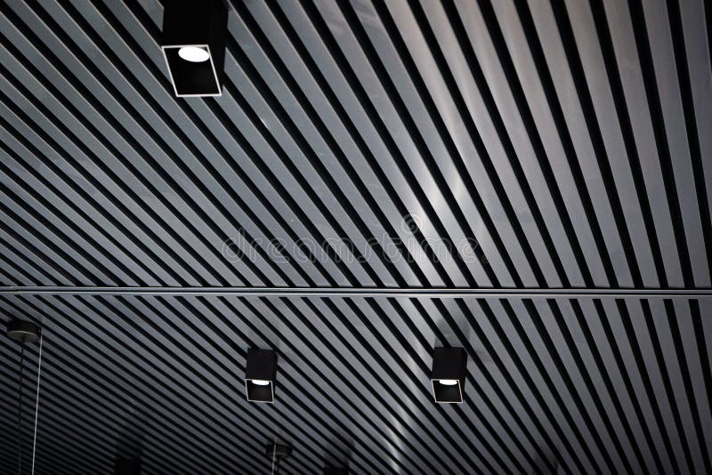 Bottom View of Lath Ceiling with Spot Lights. Abstract Modern ...