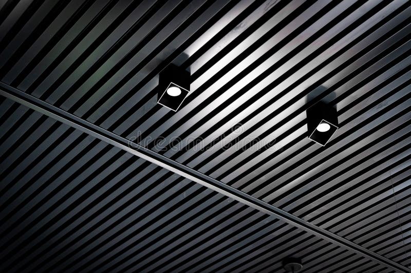Bottom View of Lath Ceiling with Spot Lights. Abstract Modern ...