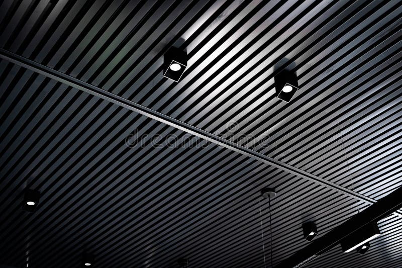 Bottom View of Lath Ceiling with Spot Lights. Abstract Modern ...