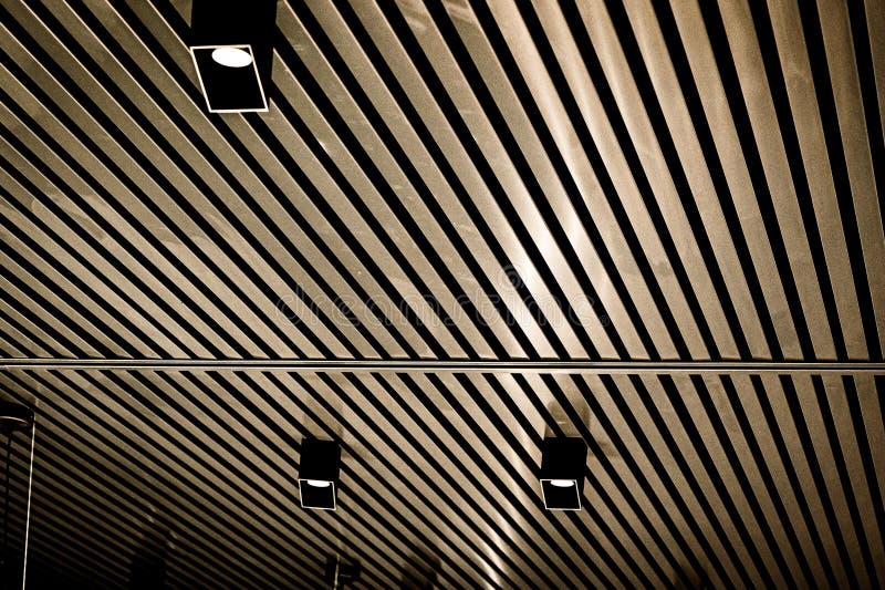 Bottom View of Lath Ceiling with Spot Lights. Abstract Modern ...