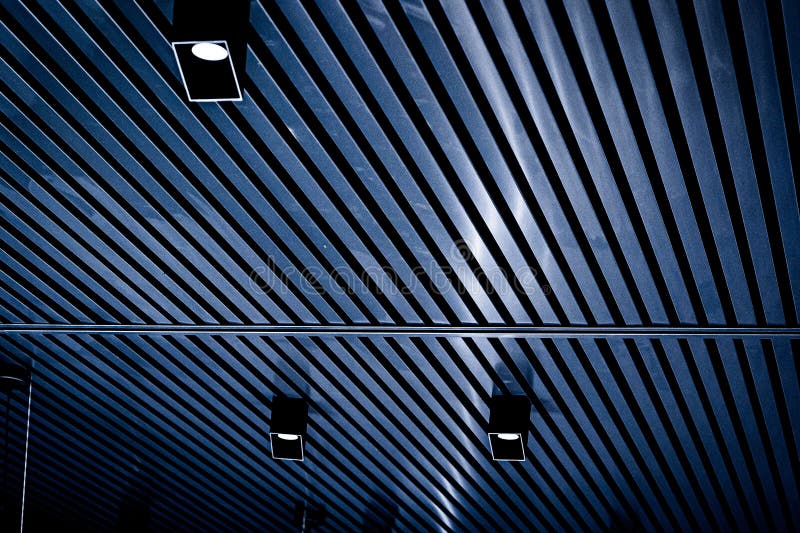Bottom View of Lath Ceiling with Spot Lights. Abstract Modern ...
