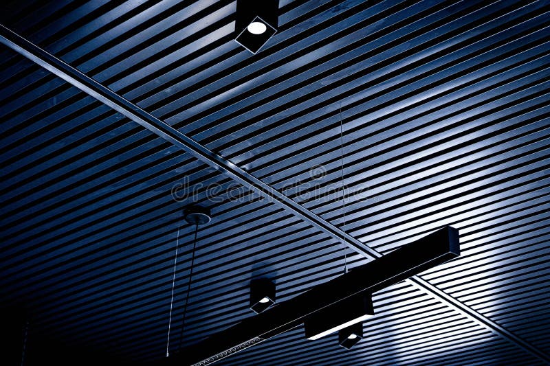 Bottom View of Lath Ceiling with Spot Lights. Abstract Modern ...