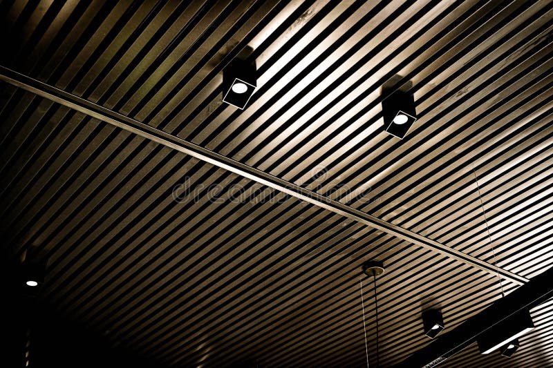 Bottom View of Lath Ceiling with Spot Lights. Abstract Modern ...