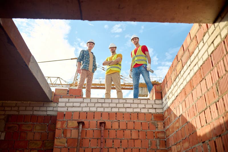 Bottom View of Men Standing on Building Under Construction Stock Image ...