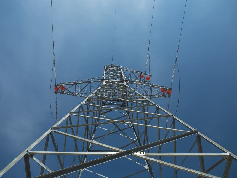 Bottom View of a Metal Support of a High Voltage Power Line with Red ...